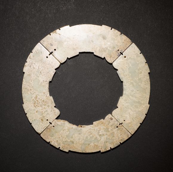 Bonhams : A set of four jade huang, or other objects of similar form ...