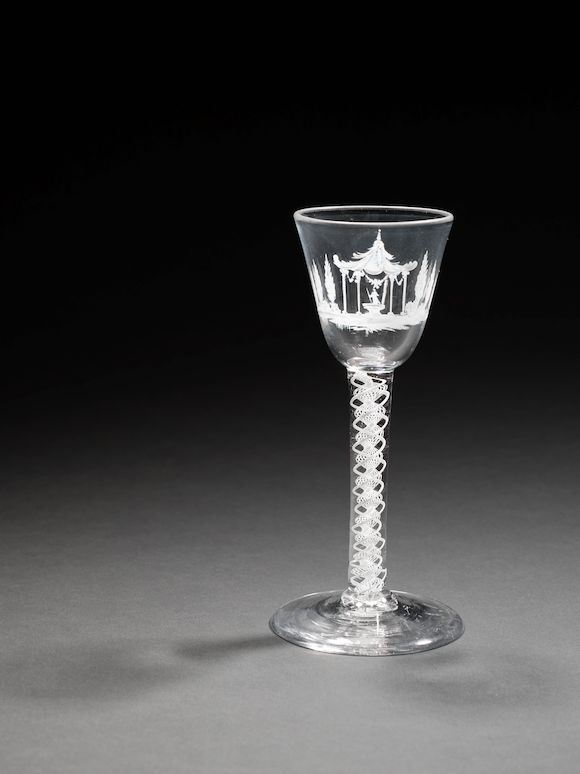 Bonhams : A Beilby enamelled opaque-twist wine glass, circa 1765