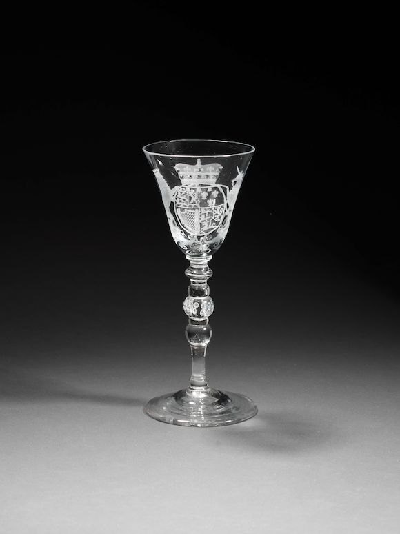 Bonhams : A Dutch engraved Royal armorial light-baluster wine glass ...