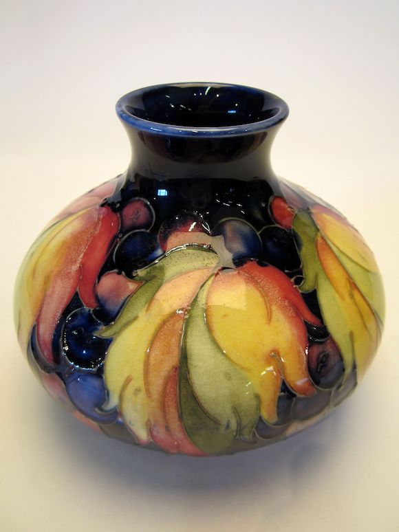 Bonhams : A William Moorcroft 'Leaf and Grape' pattern vase Circa 1930