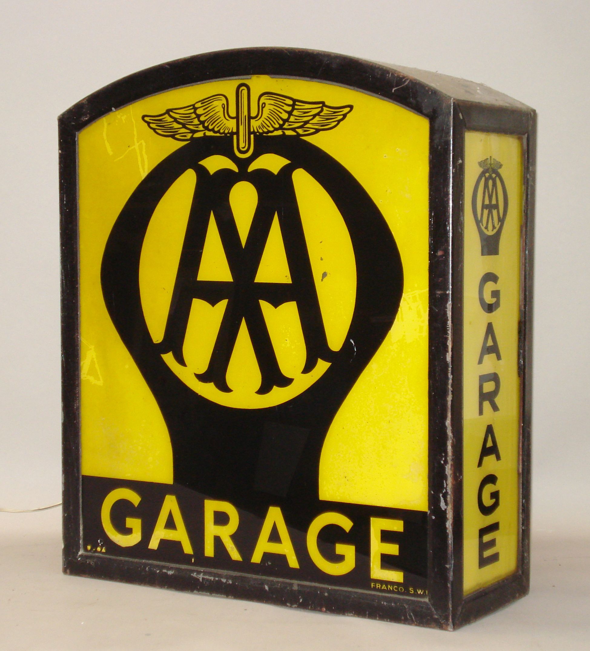Bonhams Cars : An 'AA Garage' glass illuminating forecourt sign,