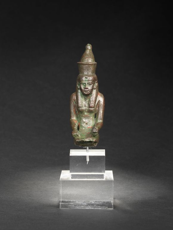 Bonhams : An Egyptian bronze seated figure of Mut