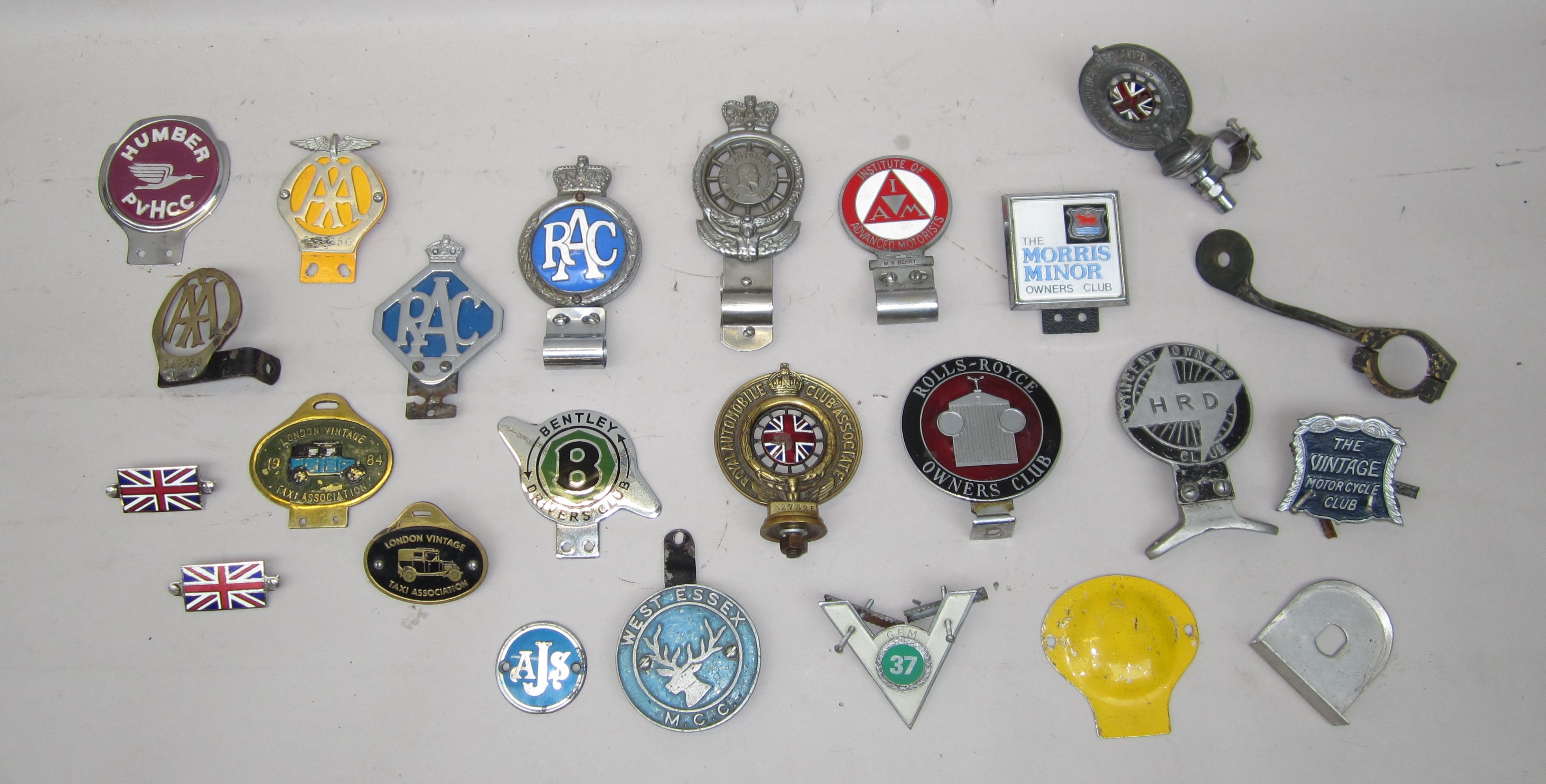 Bonhams Cars : Sixteen motoring badges,