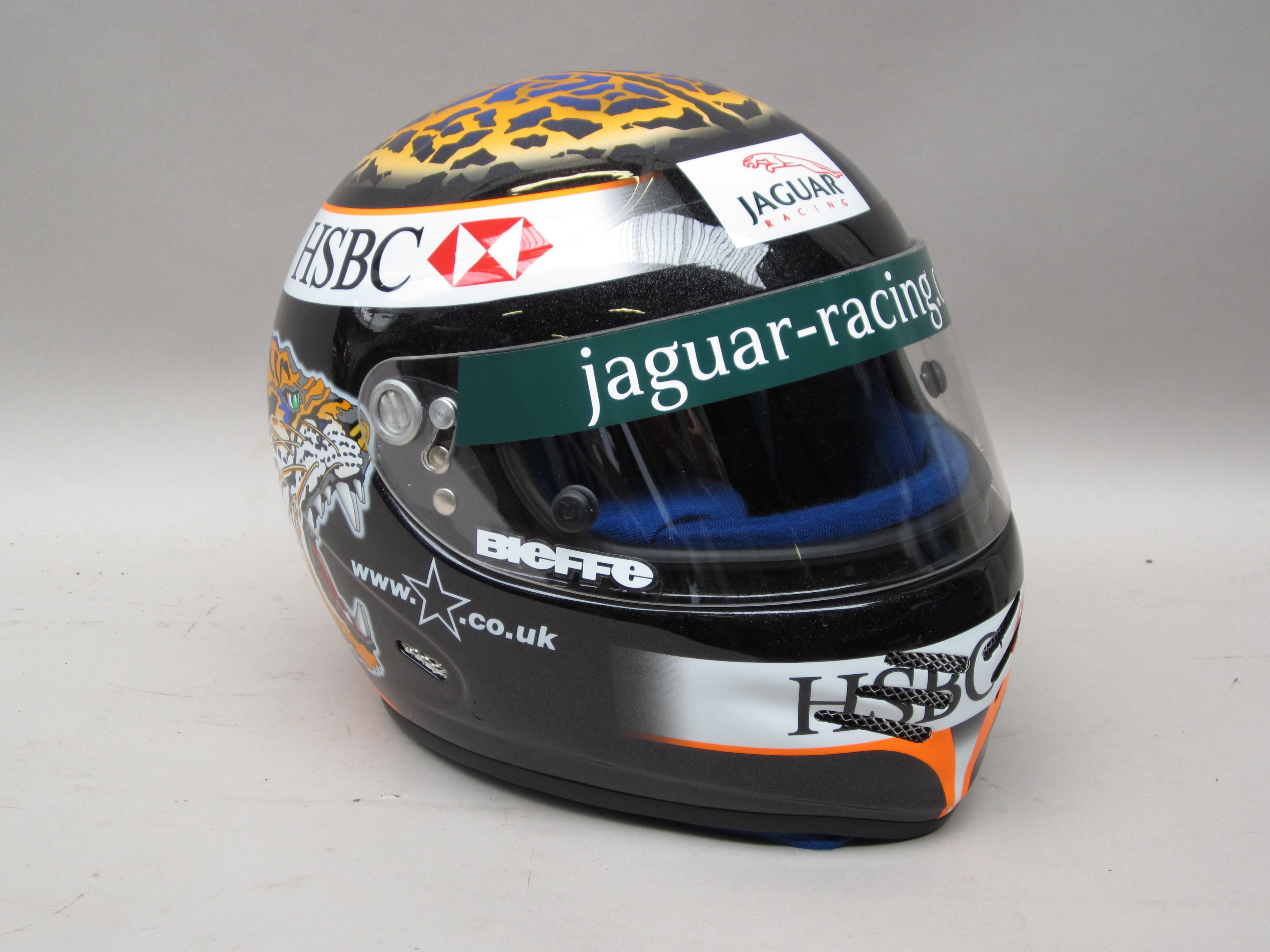 Bonhams Cars : A replica Eddie Irvine helmet by Bieffe of Italy,