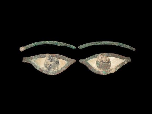 Bonhams : A pair of Egyptian bronze eye inlays 4