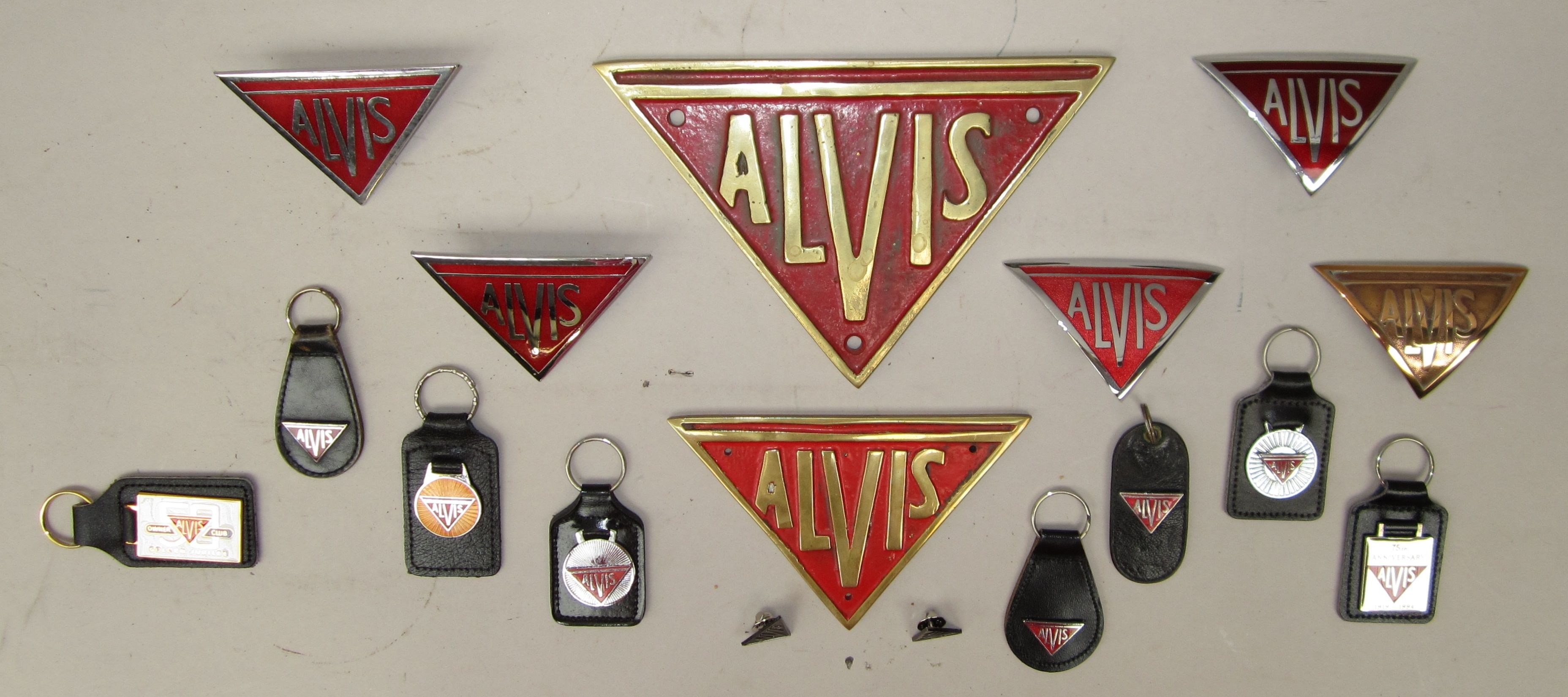 Bonhams Cars : A good collection of Alvis red triangle badges,