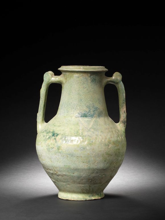 Bonhams : A Parthian green glazed pottery amphora