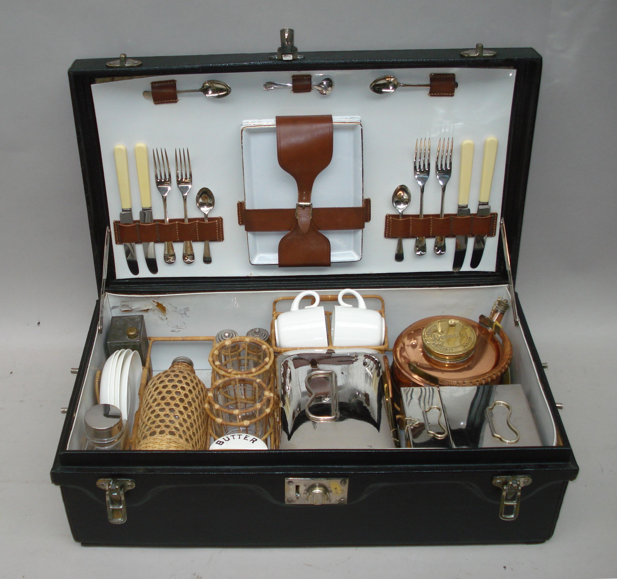A four person picnic set by Coracle, circa 1925, - auctions & price archive