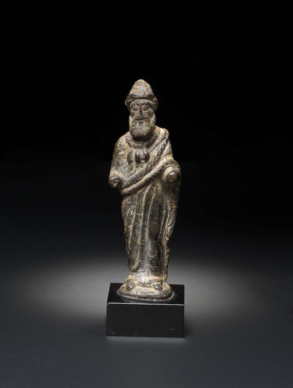 Bonhams : A Roman bronze figure of Zeus Labraundos