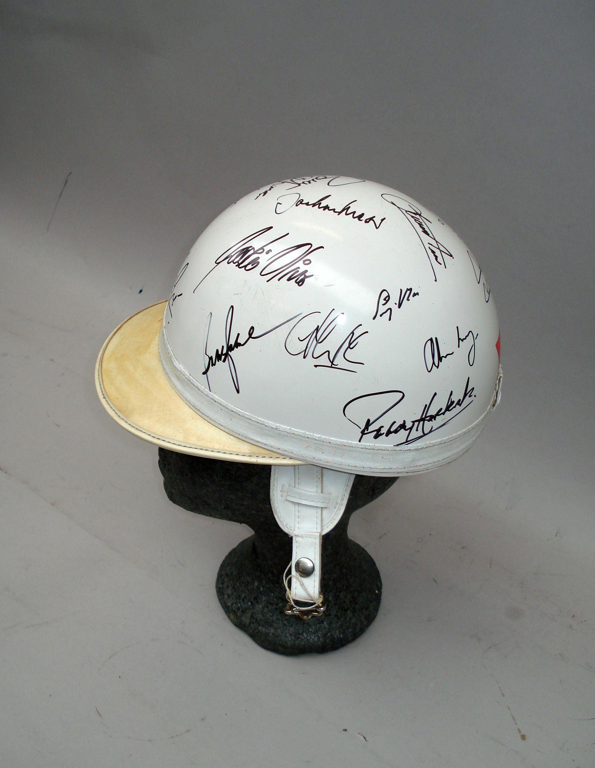 Bonhams Cars : A signed 1950s/1960s white race helmet,