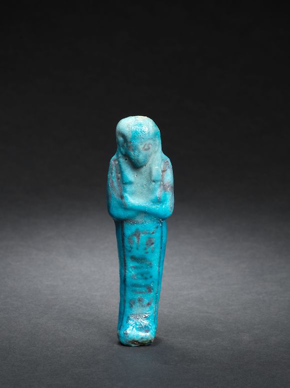Bonhams : An Egyptian blue glazed composition shabti