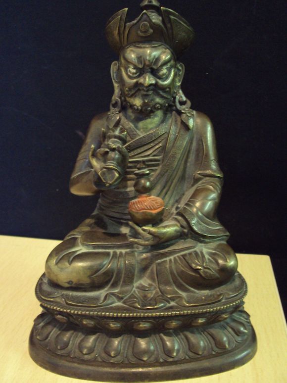 Bonhams : A Chinese bronze figure of a seated immortal on double lotus ...