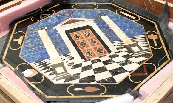 Bonhams : An inlaid marble octagonal table top, nset eith a ...