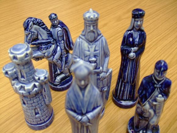 Bonhams : A blue and white glazed ceramic figural chess set, in the ...