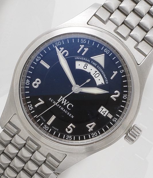 Bonhams : IWC. A stainless steel automatic calendar dual time zone ...
