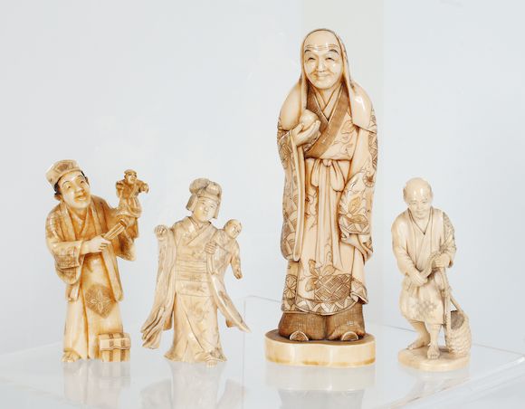 Bonhams : Three Japanese ivory and one walrus tusk figures Circa 1900