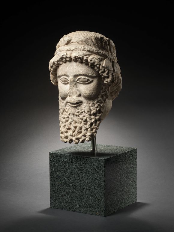 Bonhams : A Cypriot monumental limestone male votive head