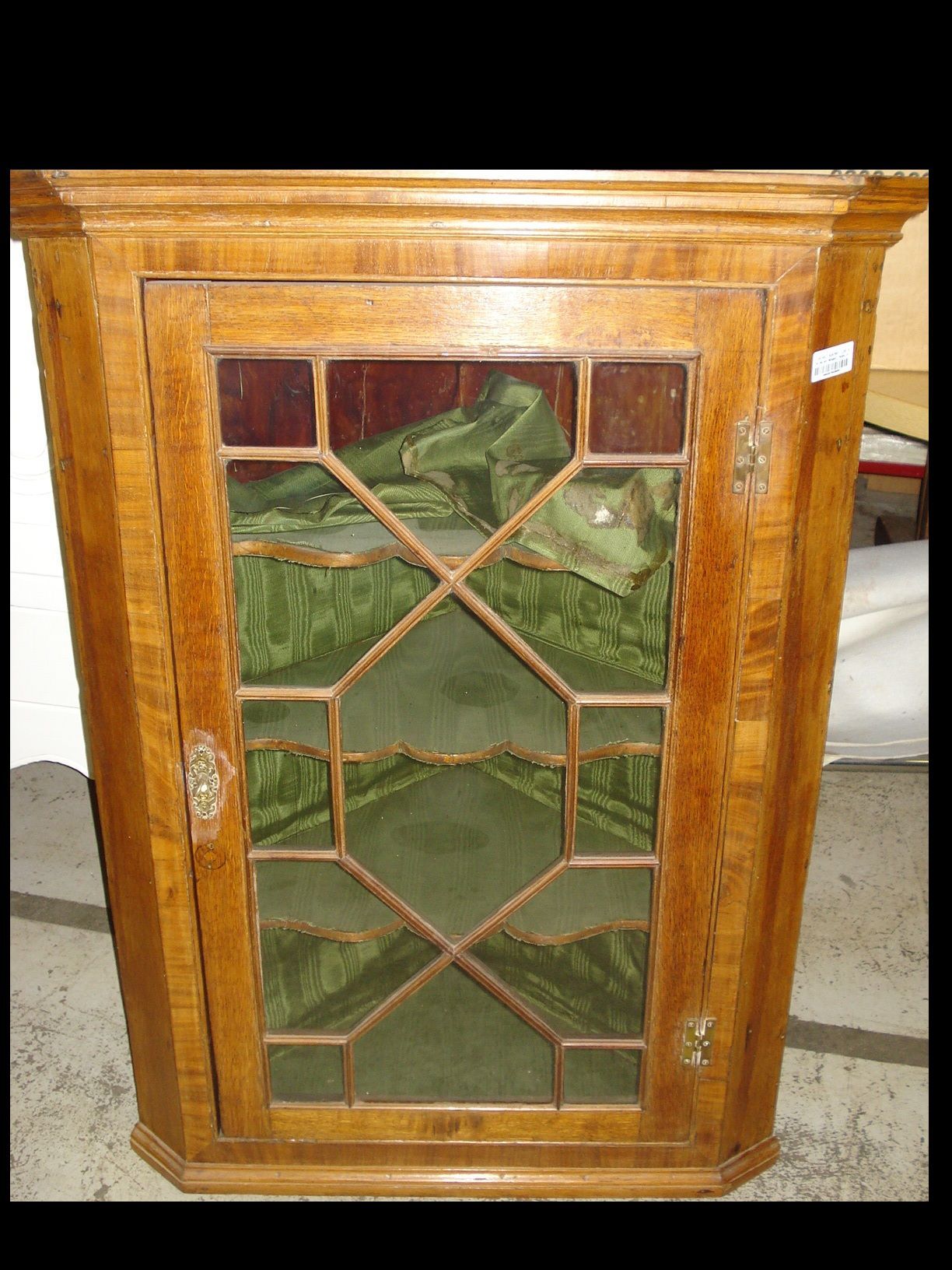 Bonhams : An 18th century oak and mahogany hanging corner display cabinet