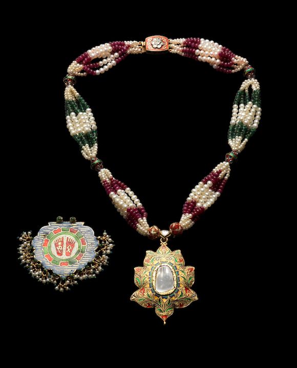 Bonhams : An enamelled gold Vishnupada (Sacred Footprint) Pendant ...