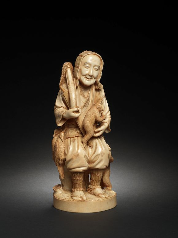 Bonhams : An ivory okimono of a hunter with monkeys By Seigyoku, Meiji ...