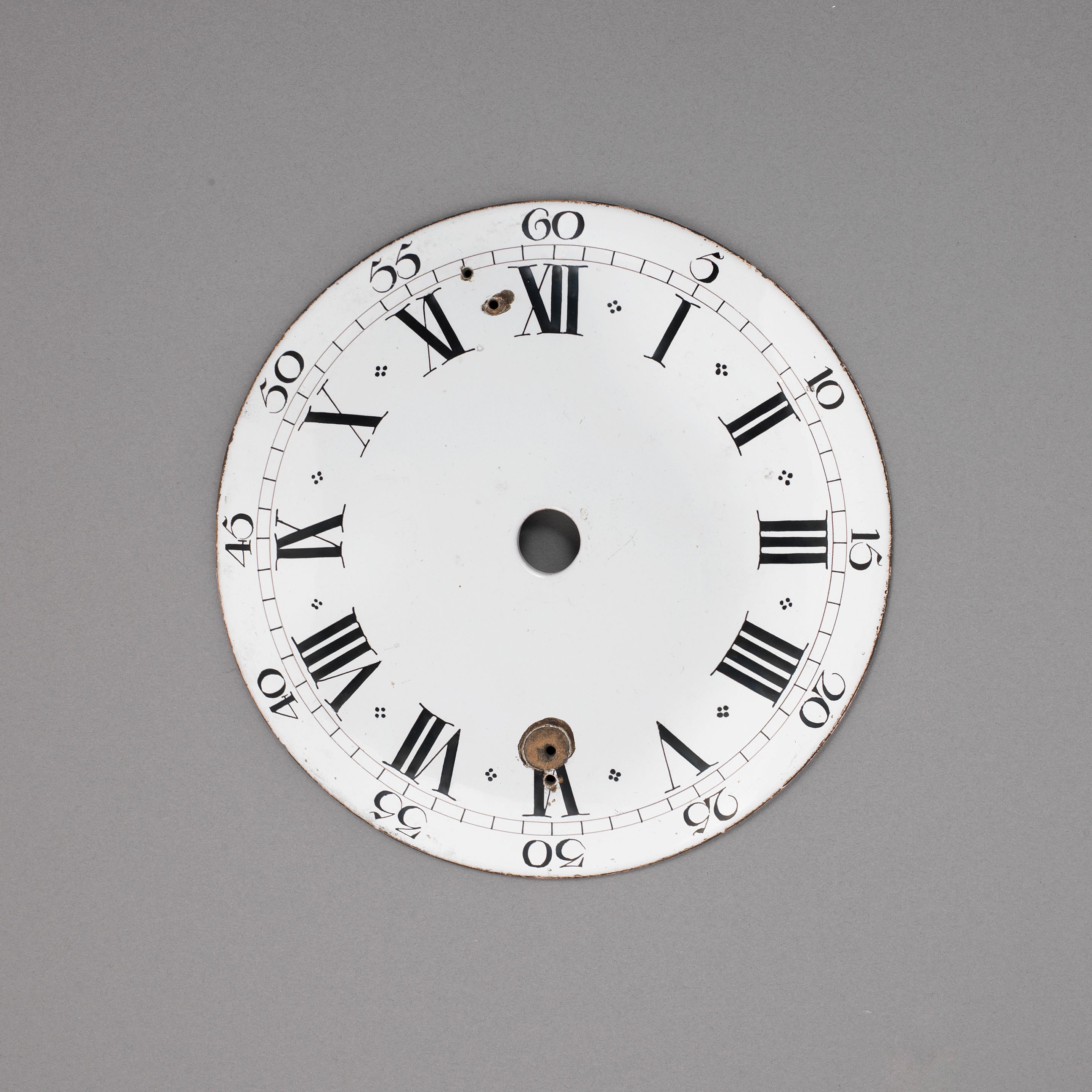Bonhams : A British delftware clock dial plate, late 18th century