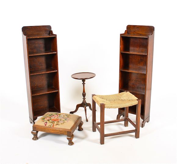 Bonhams : A pair of 1920s oak open upright bookcases, two stools and a ...