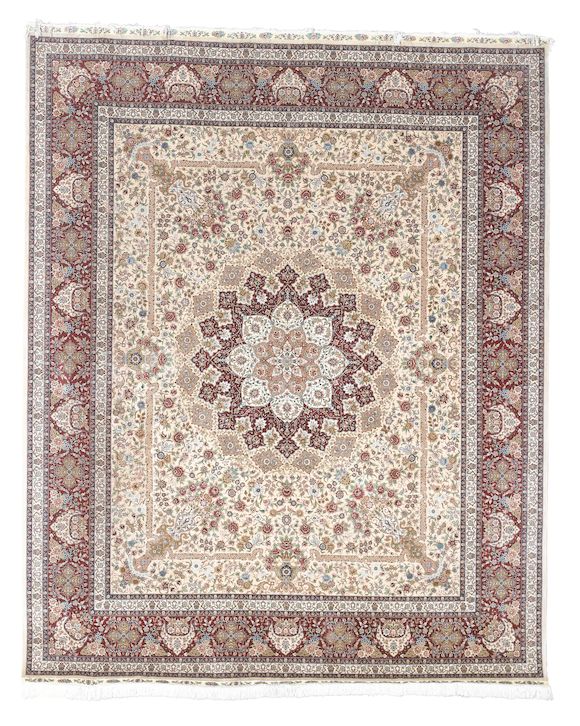 Bonhams : A silk Ghom carpet Central Persia, 310cm x 248cm
