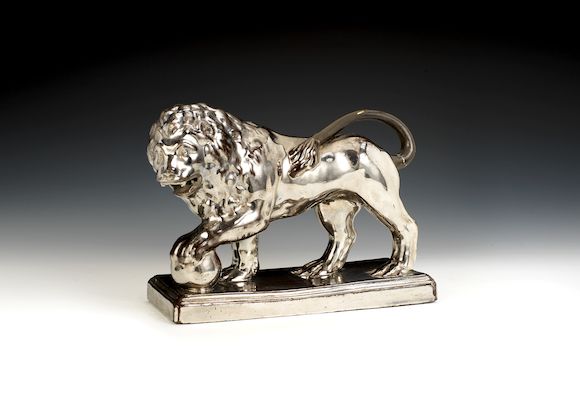 Bonhams : A rare Staffordshire silver lustre lion, early 19th century