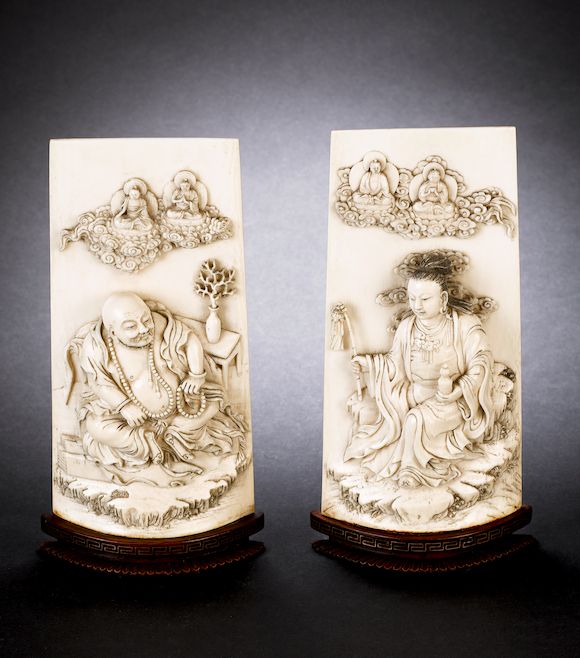 Bonhams : A pair of stained ivory plaques of trapezoid form; one ...