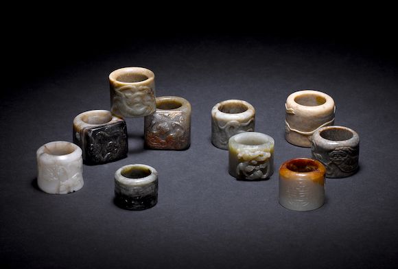 Bonhams : Ten jade archer rings of circular form