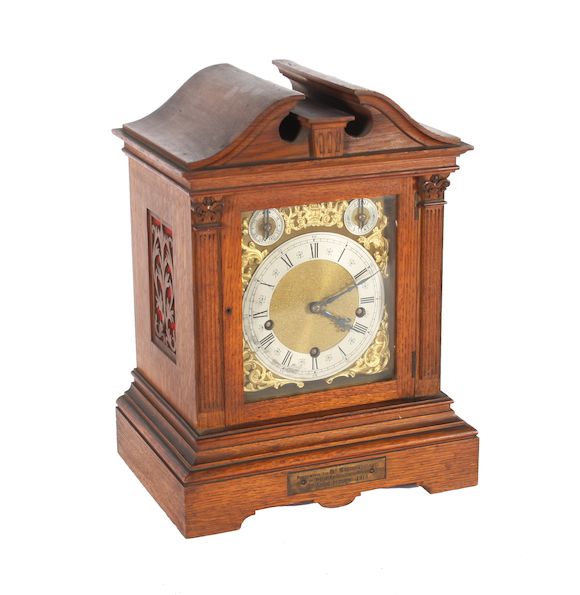 Bonhams : An Edwardian oak cased mantel clock