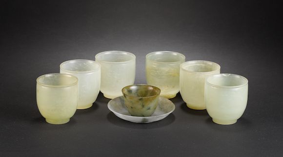 Bonhams : A small mottled, dark green, jadeite cup Qianlong four ...