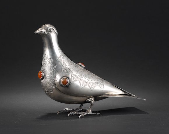 Bonhams : A white-metal figure of a dove, decorated with four cornelian ...