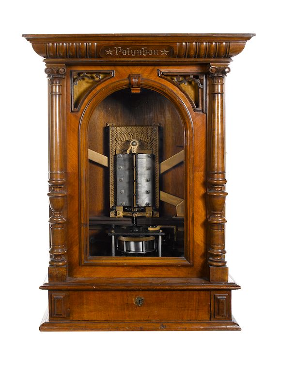 Bonhams : A coin-operated 19.5/8-inch Polyphon upright disc musical box ...