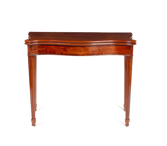 Bonhams : A George III mahogany serpentine fold-over tea tableWith ...