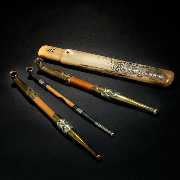 Bonhams : Three 19th century bamboo and gilt metal pipes and a bone ...