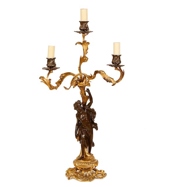 Bonhams : A late 19th century gilt and patinated bronze figural candelabra