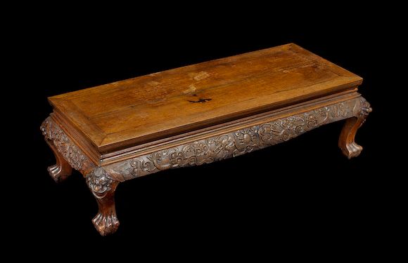 Bonhams : A Chinese wood low table, or kang, of rectangular form