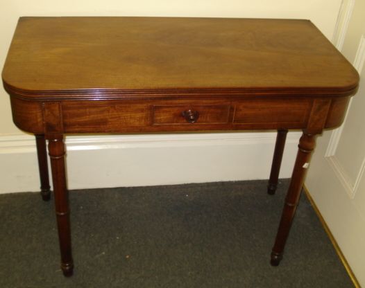 Bonhams : A 19th Century mahogany tea table, the rounded rectangular ...