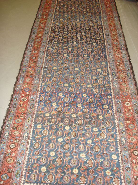 Bonhams : A North West Persian runner 475cm x 105cm