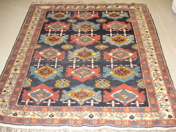Bonhams : A Caucasian design rug 171cm x 150cm