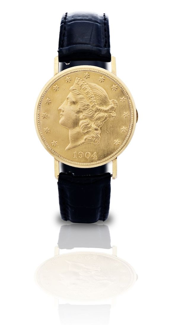 Bonhams : Juvenia. A two colour 18ct gold manual wind coin ...