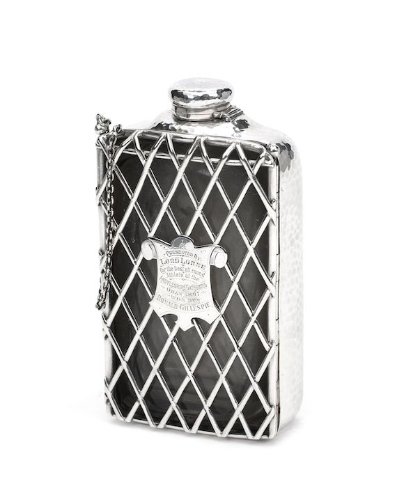 Bonhams : TIFFANY: A silver caged glass spirit flask, incuse marks ...
