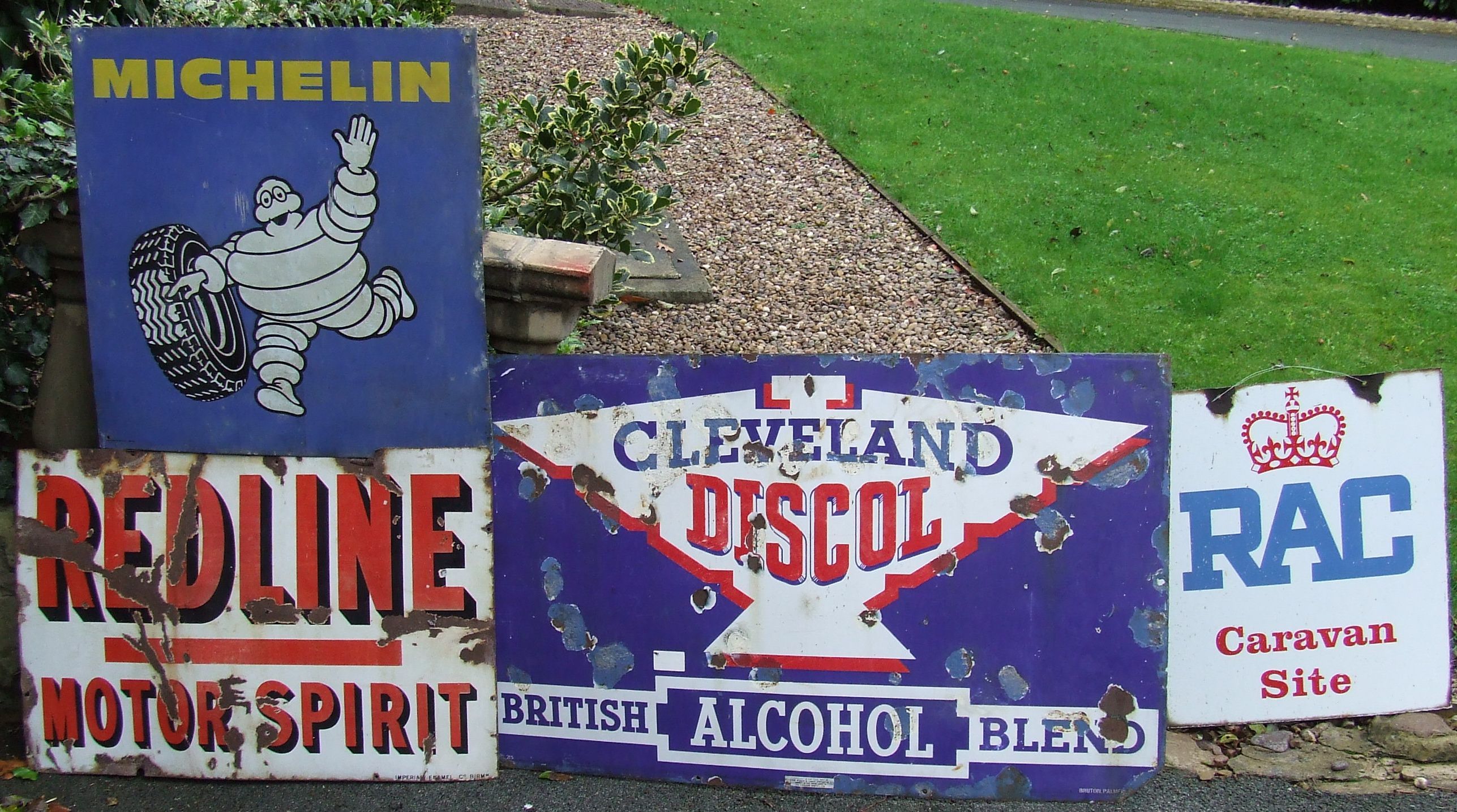 Bonhams Cars : Three enamel garage signs,