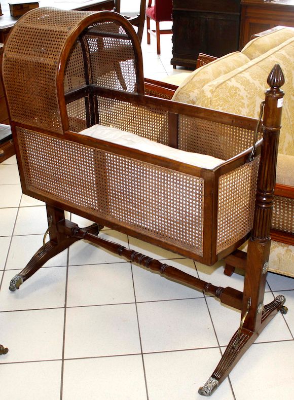 Bonhams : An early 19th Century cradle,with caned canopy and sides, on ...