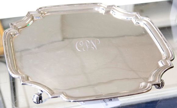 Bonhams : A silver shaped square salver,