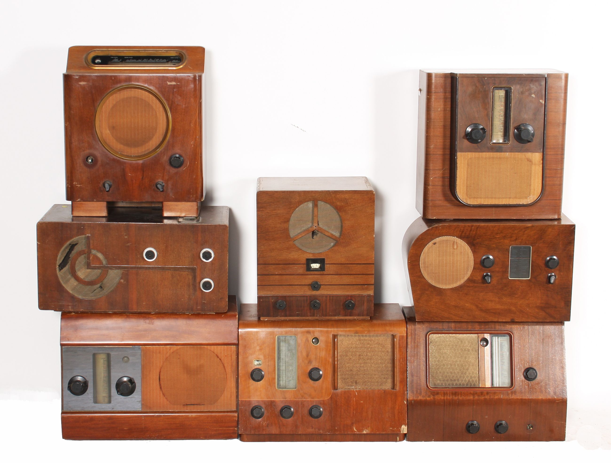 Bonhams : Eight various Murphy radios in walnut cases designed by R.D ...