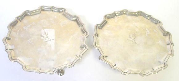 Bonhams : A pair of George II silver waiters, by Dennis Langton, London ...