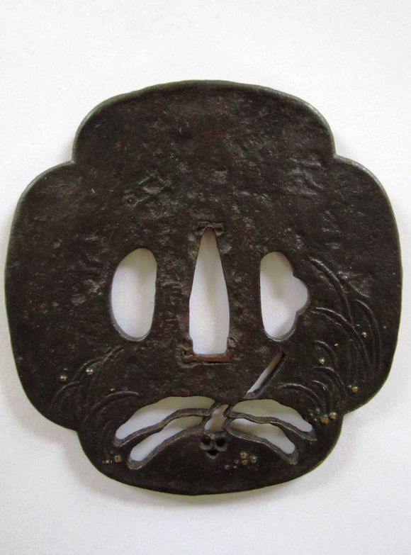 Bonhams : A cast iron tsuba with dragonfly Meiji
