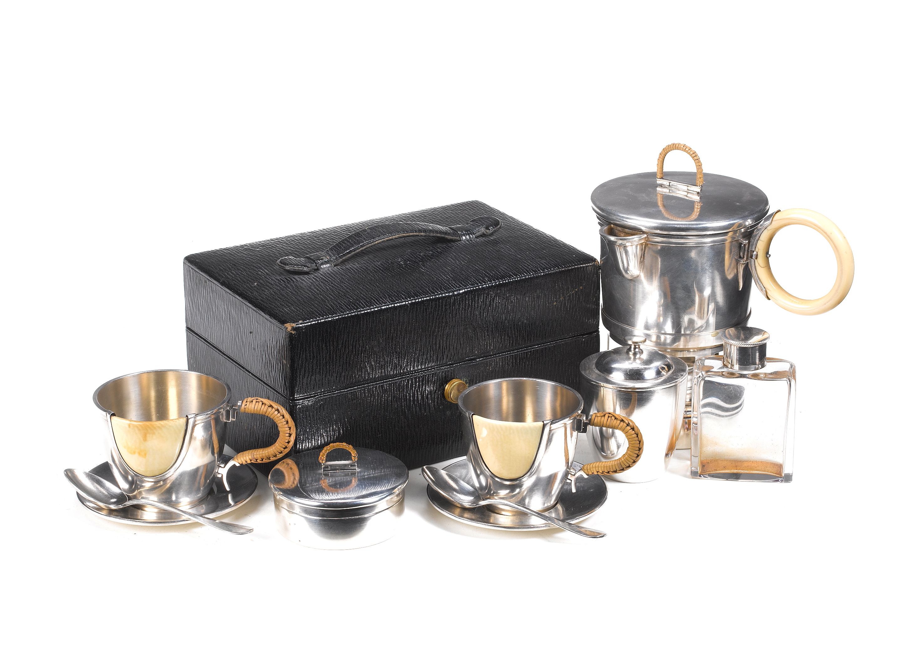 Bonhams Cars : A fine and rare leather-cased two-person tea set, by ...